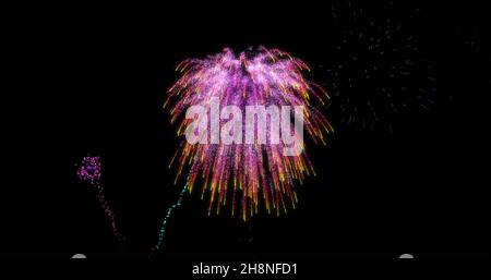 Image of colourful christmas and new year fireworks exploding in night ...