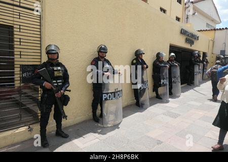 Peru riot police with shields in street at Carnival Cusco cars police ...