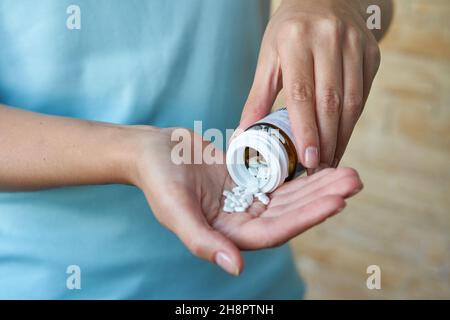 Heartache medicine. Pill in shape of heart against heart pain Stock ...