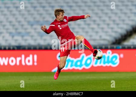 Adelaide United forward Kristian Opseth (11) kicks the ball Stock Photo ...