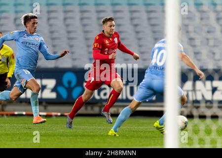 Midfielder Ryan Kitto of Adelaide United strikes the ball during the ...