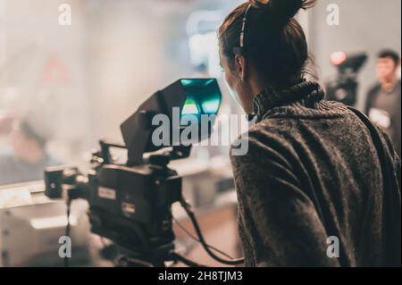 Behind the scene. Multiple camera setup. Cameraman shooting the film ...