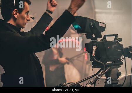 Behind the scene. Multiple camera setup. Cameraman shooting the film ...
