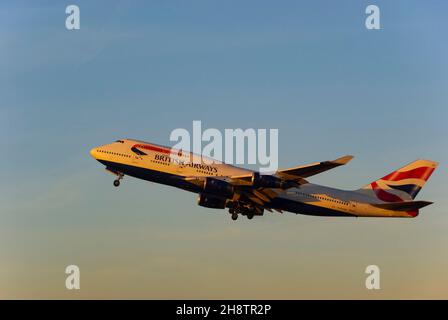 Boeing 747 taking off at sunset Stock Photo - Alamy