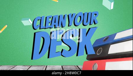 Image of clean your desk text over laptop and office items on pink ...