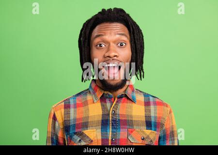 Photo of charming impressed dark skin lady wear print t-shirt smiling ...