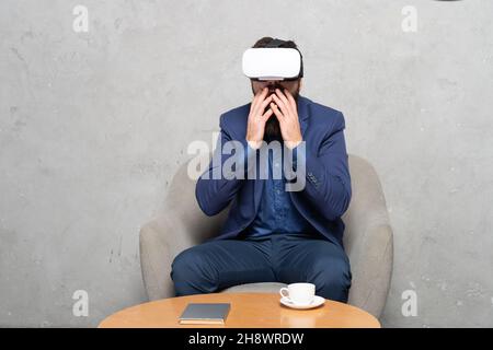 Virtual reality for endless possibilities. Shocked man boss wear VR ...