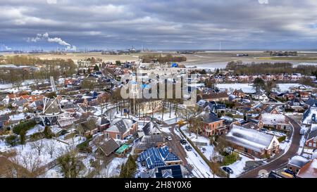 Aerial View over Village of Spijk in Winter Landscape with Snow in the ...