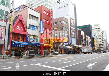 Street scene of colourful Japanese shop signs in Shibuya, Tokyo, Japan ...