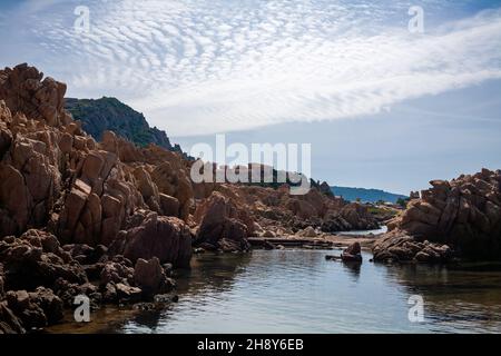 Beautiful stone coast splashed by seawater. Look on an open sea Stock ...