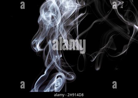 Abstraction created with smoke on a black background Stock Photo - Alamy