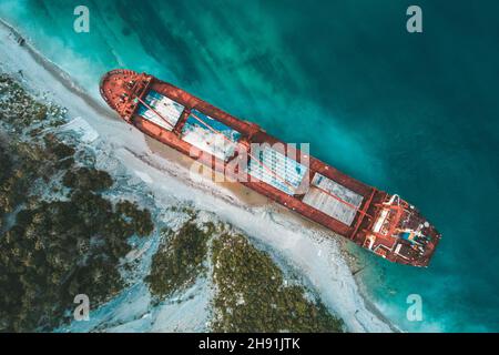 Aerial view of the ship washed ashore. Shot. Top view of an abandoned ...