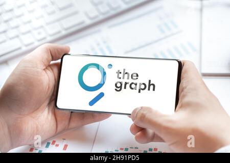 Logo of Graph coin in tablet. Cryptocurrency GRT token. Trading ...