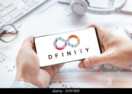 Logo of DFINITY Foundation Internet Computer in tablet. Cryptocurrency ...
