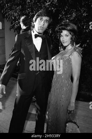 George Gradnow and Barbi Benton seen arriving to a party at Jerry Buss ...