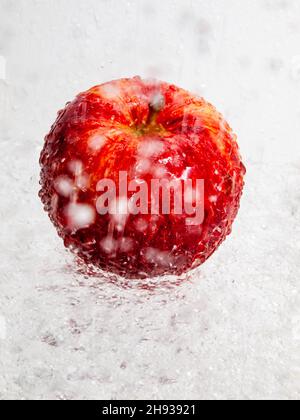 Apples splashed with water Stock Photo - Alamy