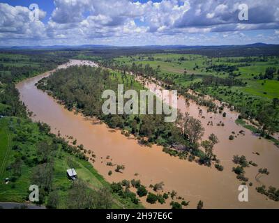 Aerial of the Burnett River in flood Dec 2021 at Wallaville Queensland ...
