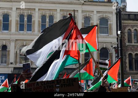 People take part in a Palestine Coalition march in central London ...