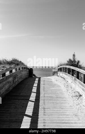 A breathtaking greyscale shot of a long bridge Stock Photo - Alamy