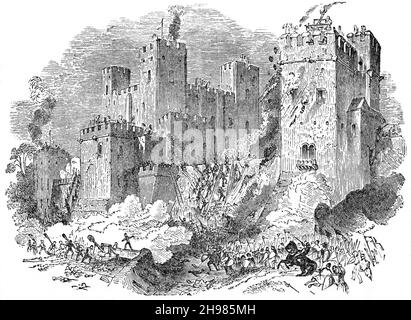 The walls of an old medieval castle. Collapsed walls preserved ...