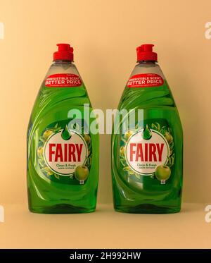 Fairy washing up liquid with a label showing the bottle is manufactured ...