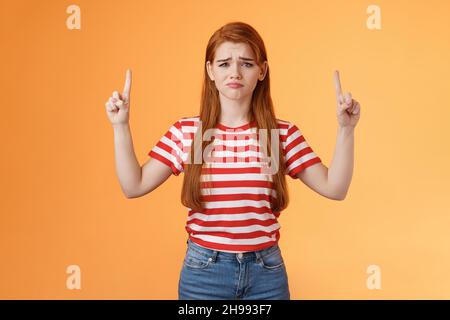 Disappointed upset cute whining timid redhead girl, gloomy face ...