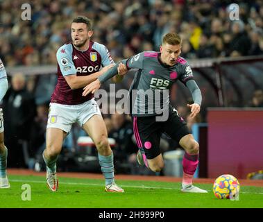 John McGinn of Aston Villa challenges Dwight McNeil of Burnley during ...