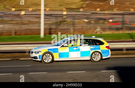 A Police Scotland police car responding at great speed to an emergency ...