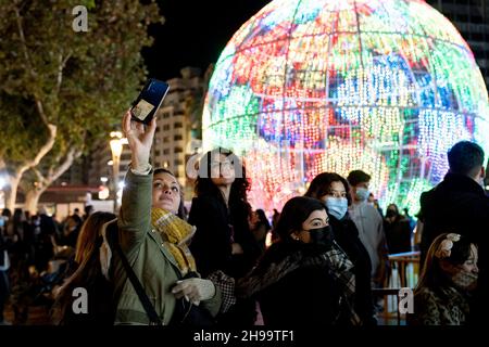 Two ladies selfie with a light show of HSBC Life Illuminations at The ...