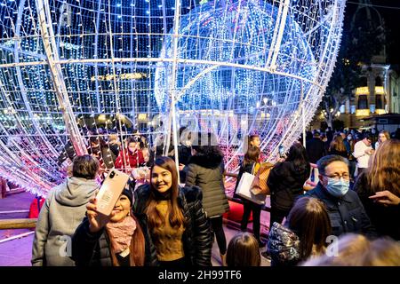 Two ladies selfie with a light show of HSBC Life Illuminations at The ...