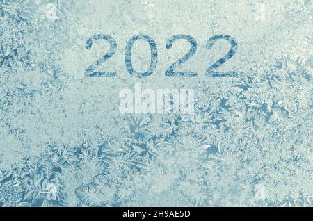 The inscription Happy New Year on a blue background Stock Photo - Alamy