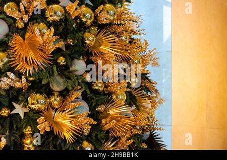 Silver Christmas ornaments in leaves Stock Photo - Alamy