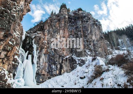 Winter Frozen Butakov Waterfall in the Butakovsky gorge. Famous travel ...