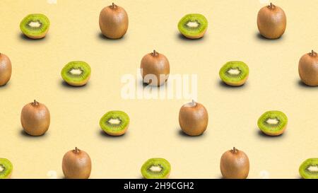Repeated pattern of many sliced ripe kiwi fruits on light green ...