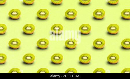 Repeated pattern of many sliced ripe kiwi fruits with one missing spot ...