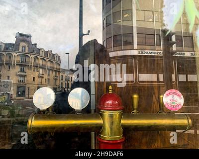 Reflections in a pub window, Charleville-Mézières, Ardennes, Grand-Est ...