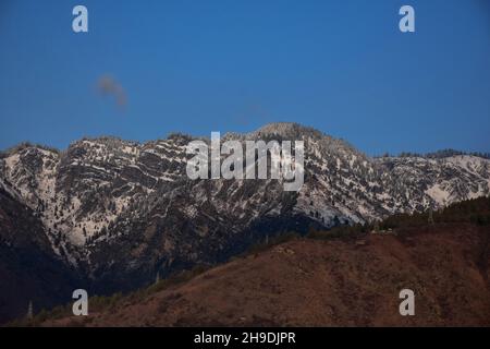 Srinagar, India. 06th Dec, 2021. An Indian tourist couple explores the ...