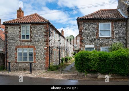 Traditional flint houses in the village of Cley Next The Sea, North ...