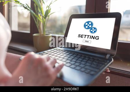 Laptop screen displaying a setting concept Stock Photo - Alamy