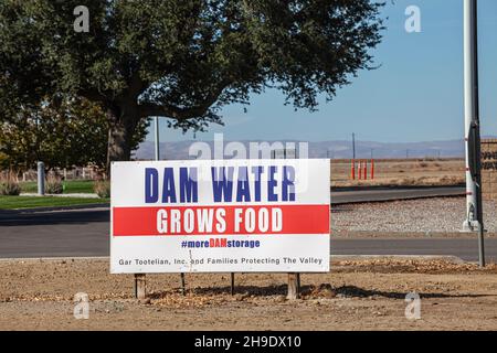 A "Dam water grows food" sign promotes the building of more water ...