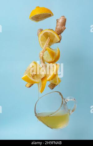 lemon slices levitating on a green background with honey drops Stock ...