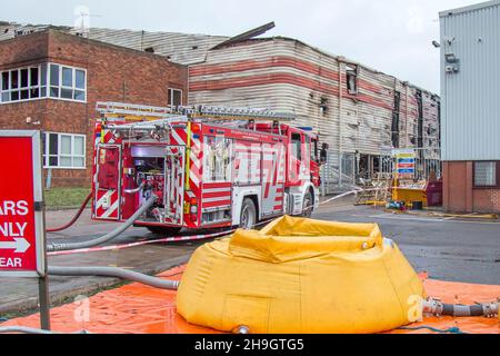 Kidderminster, UK, 7th December, 2021. Fire crews and police are still ...