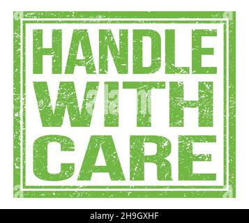 HANDLE WITH CARE, words written on black rectangle stamp sign Stock ...