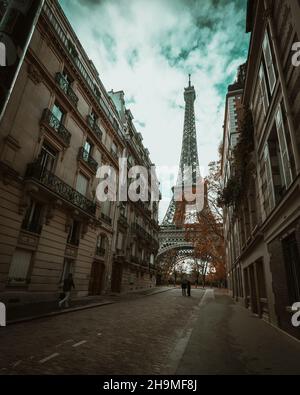 A back alley in Paris showcasing the architecture of the buildings with ...