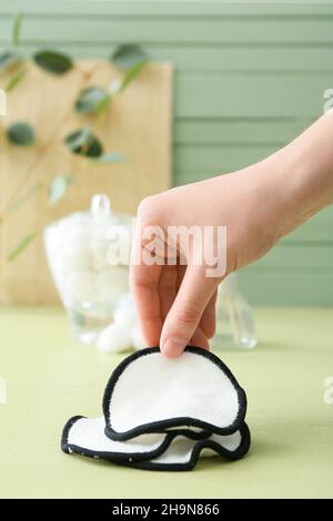 Woman with handmade cotton pad on white background Stock Photo - Alamy