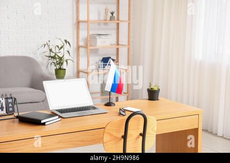 Interior of modern office with Russian flag Stock Photo - Alamy
