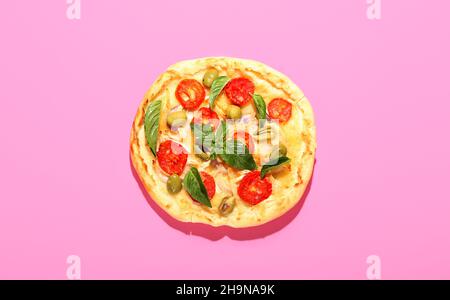 Delicious mini pizza on pink background with space for text Stock Photo ...