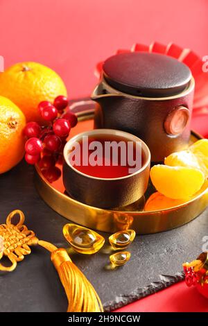 Traditional tea with Chinese symbols on light background Stock Photo ...