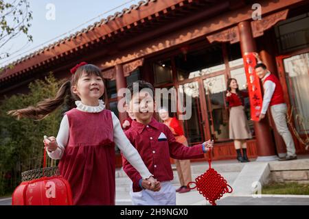Happy children playing chase celebrates the New Year Stock Photo - Alamy