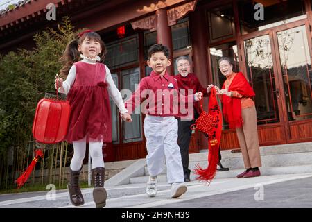 Happy children playing chase celebrates the New Year Stock Photo - Alamy